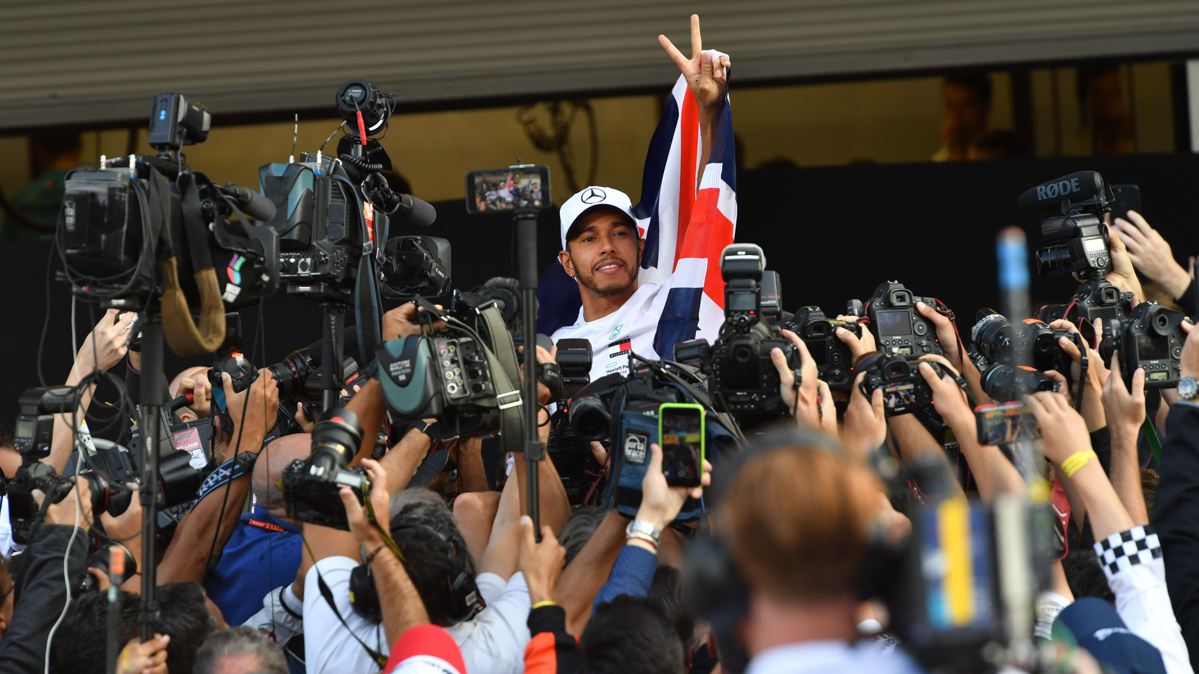 IN PICTURES: Hamilton celebrates historic fifth title triumph