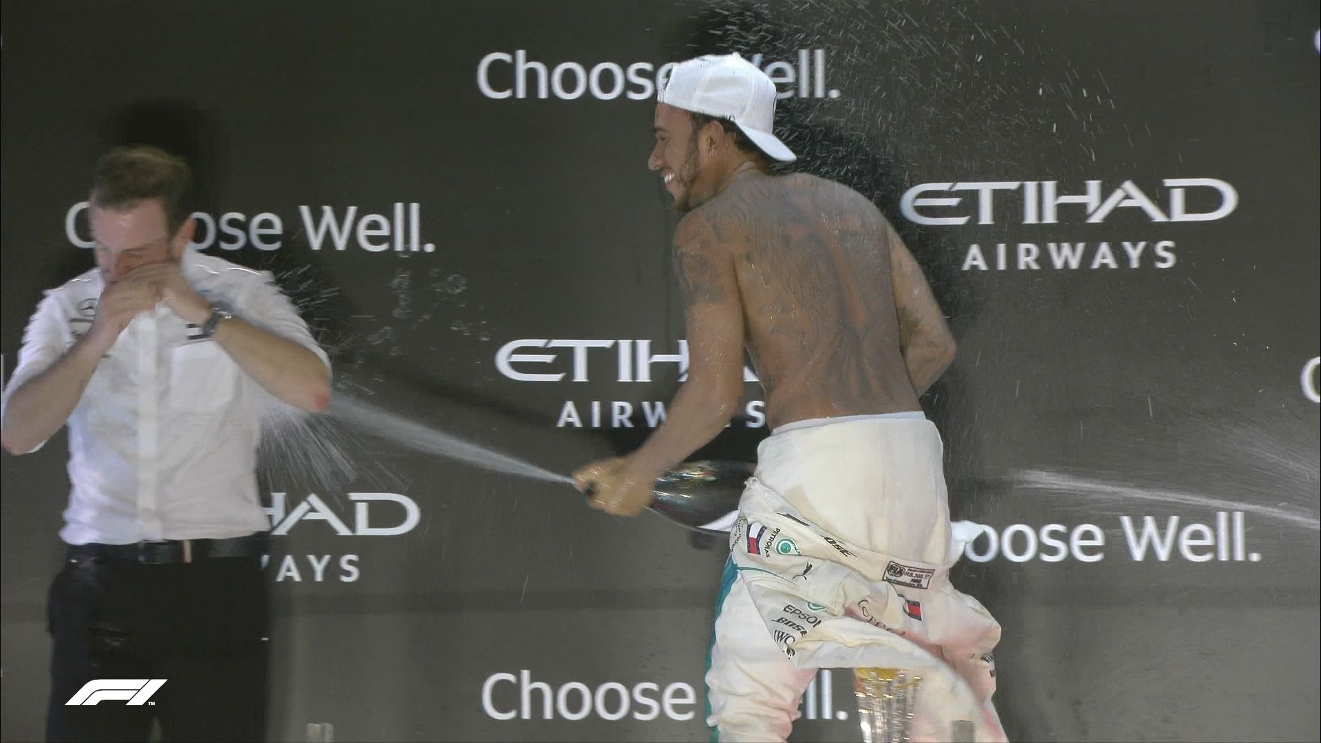 MUST-SEE: Hamilton reveals tattoos in unique podium celebration ...
