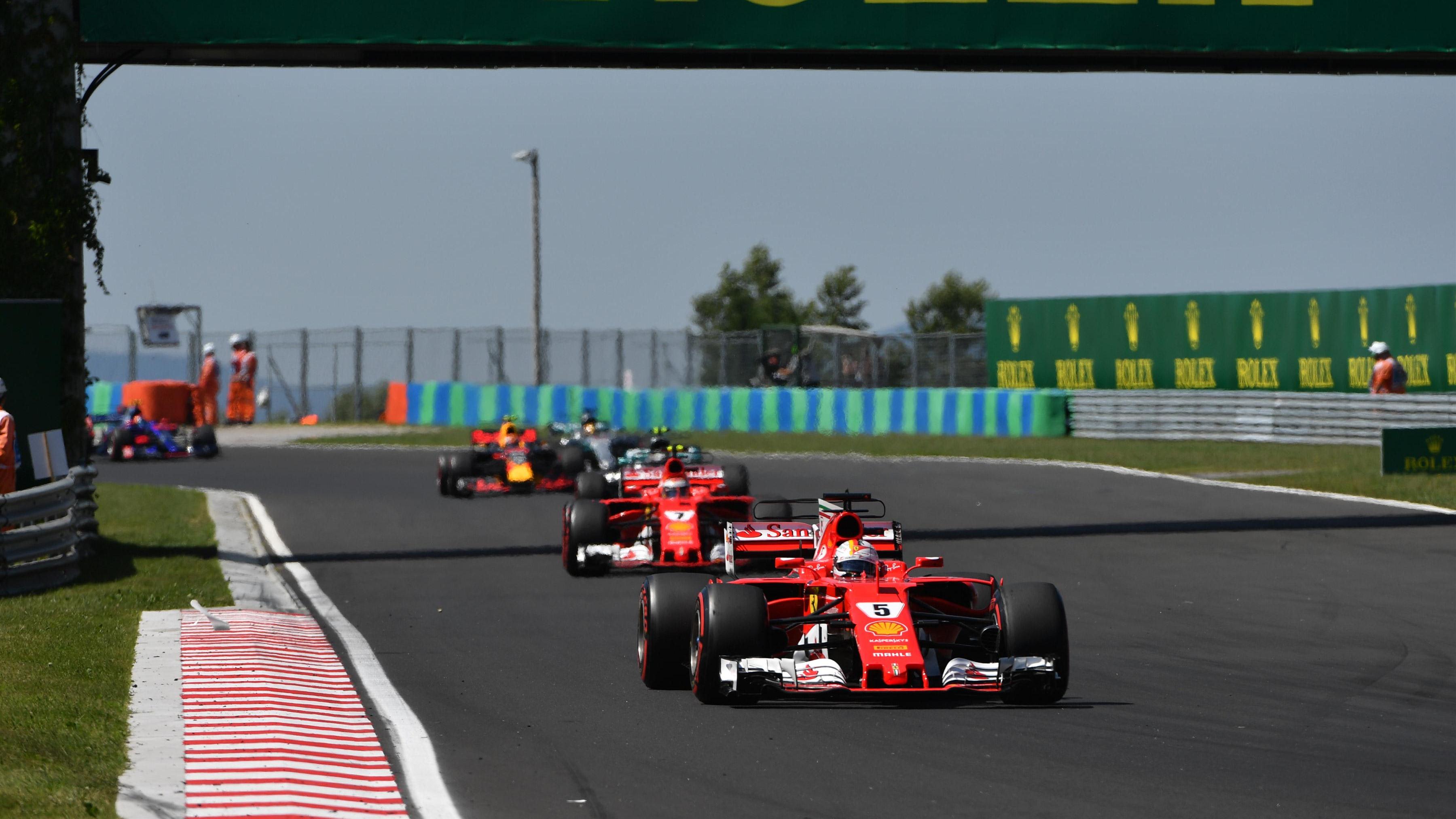 Race - Vettel wins as Ferrari prove unstoppable in Hungary