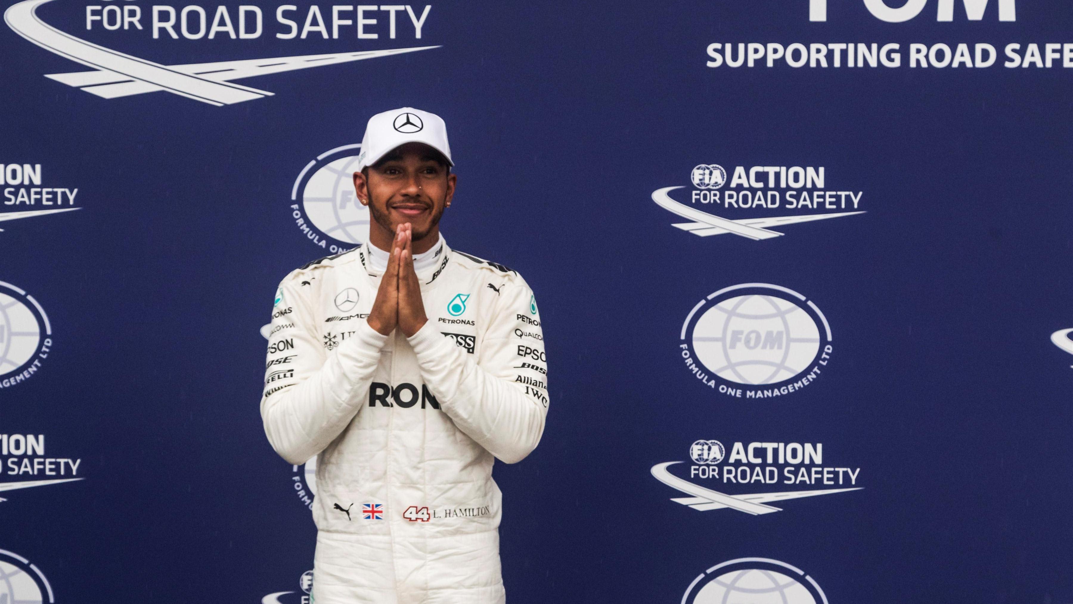 Hamilton hails ‘epic day’ after making pole-position history