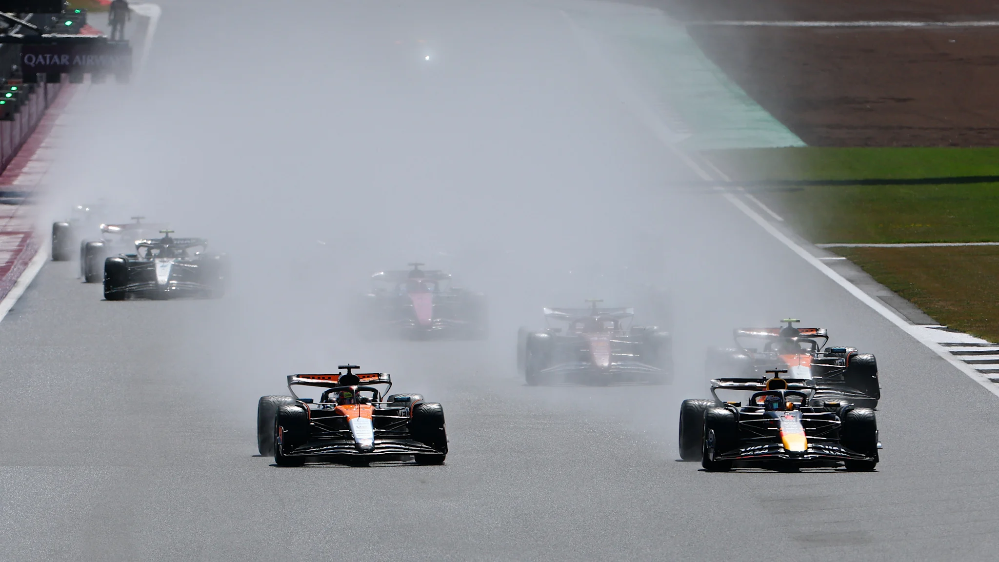 RACE START: Max Verstappen fends off Oscar Piastri at the start of the ...